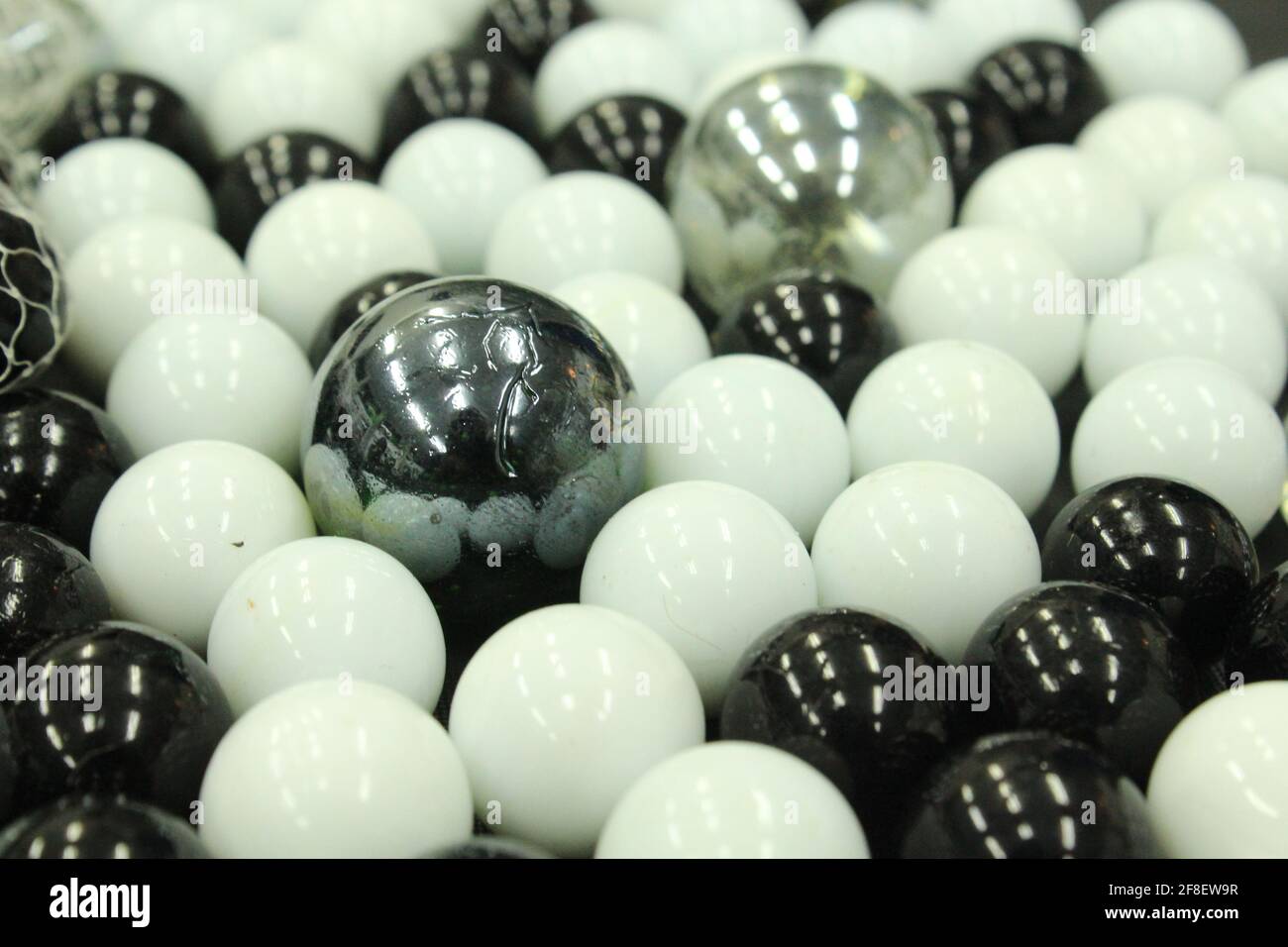 Black and white solid color marbles Stock Photo - Alamy