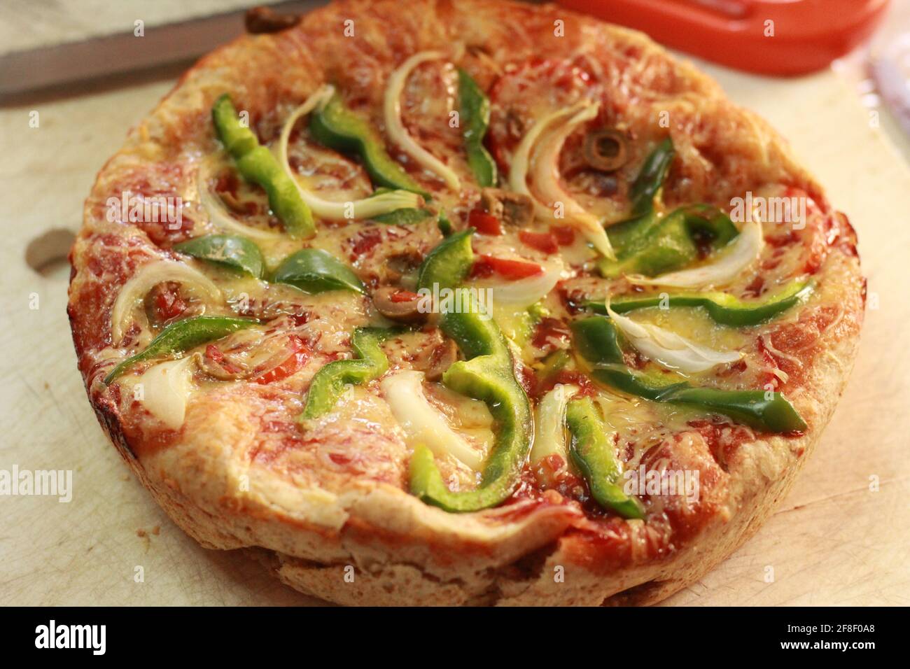 Deep pan cheese tomato pizza not slice hi-res stock photography and ...