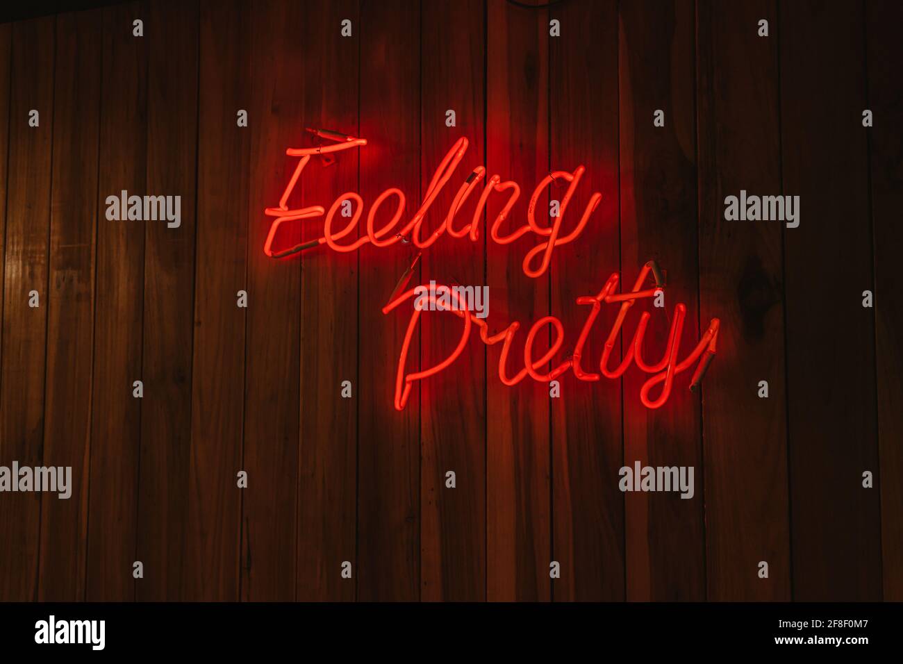 Wide shot of feeling pretty neon sign Stock Photo - Alamy