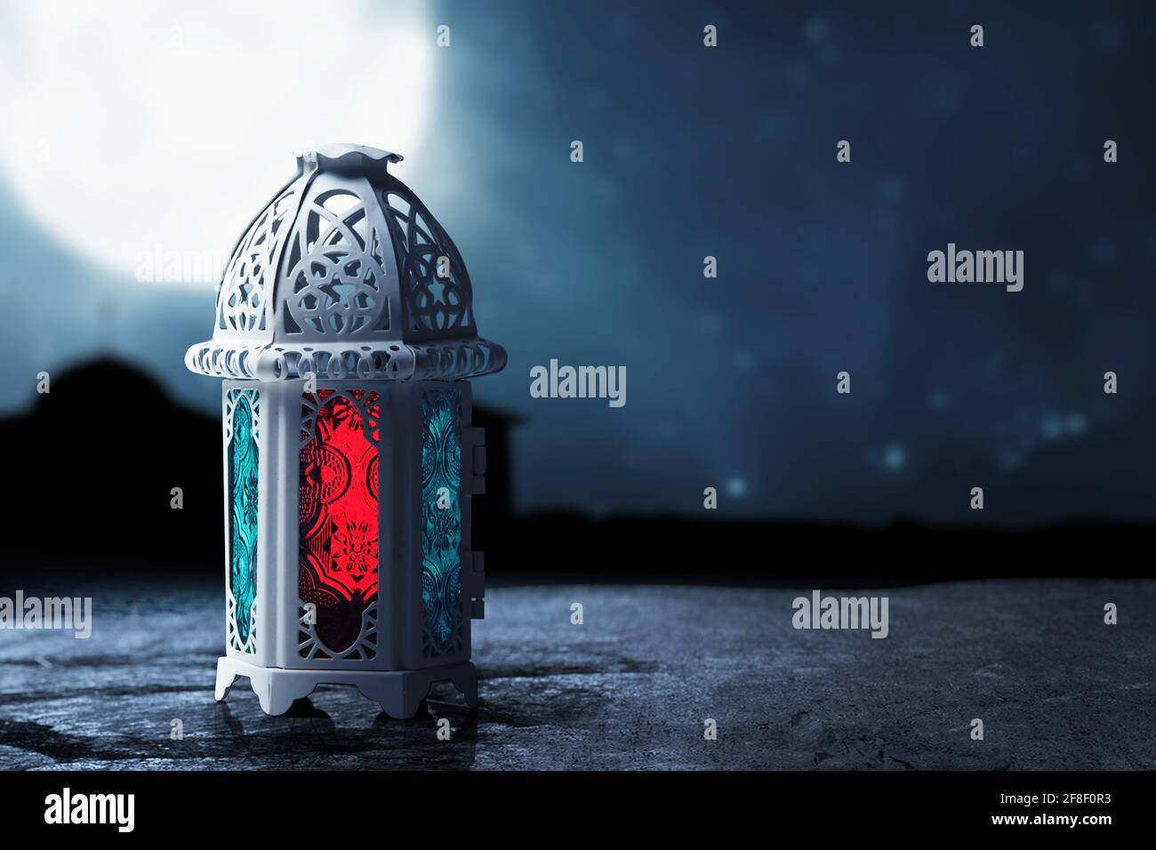 Arabic lamp with colorful light on the floor with the night scene ...