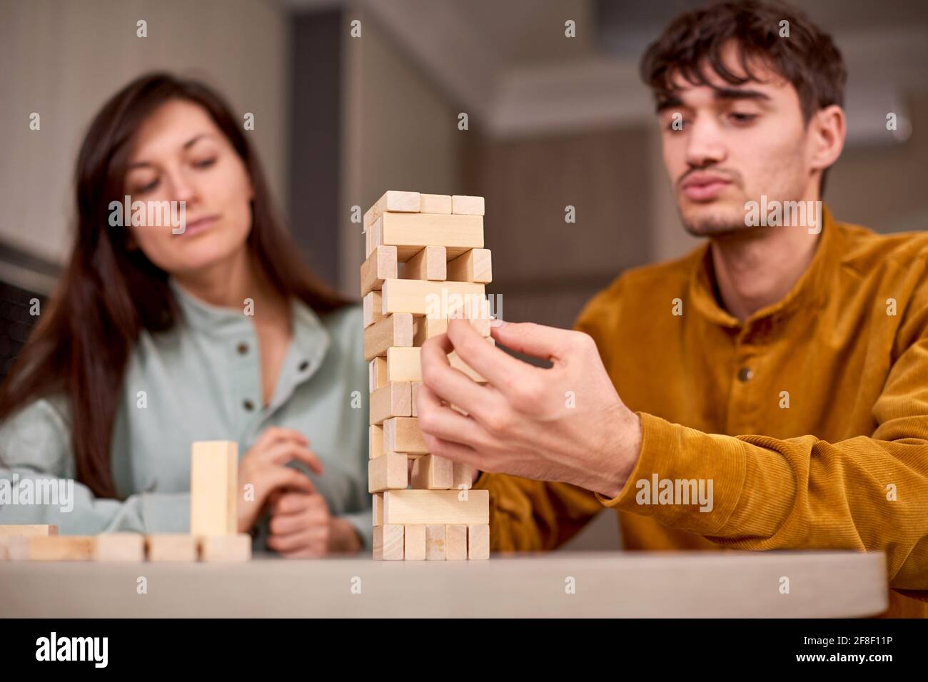 Friends playing jenga hi-res stock photography and images - Alamy