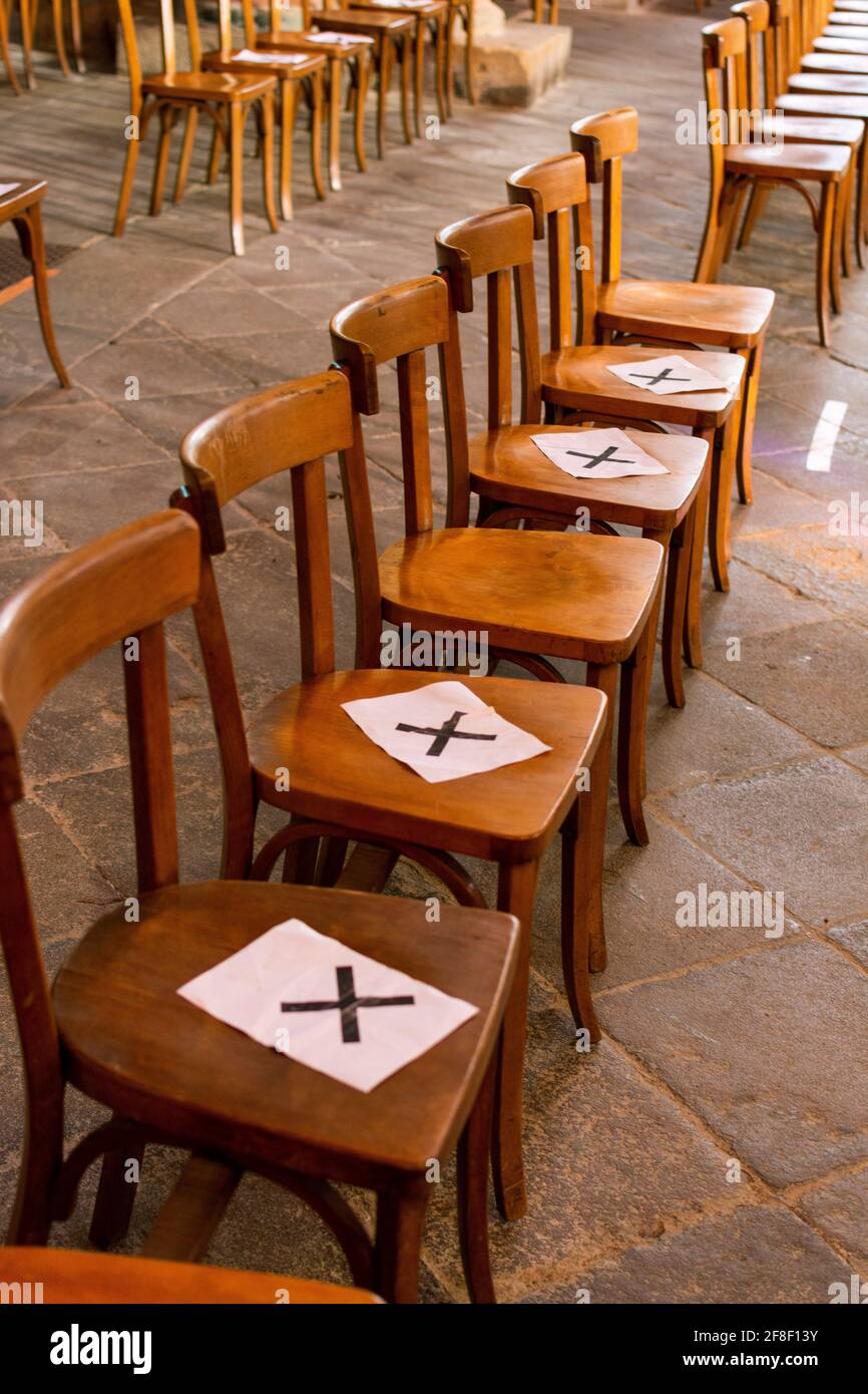 Social distance, Covid 19, chairs in a church, France Stock Photo - Alamy