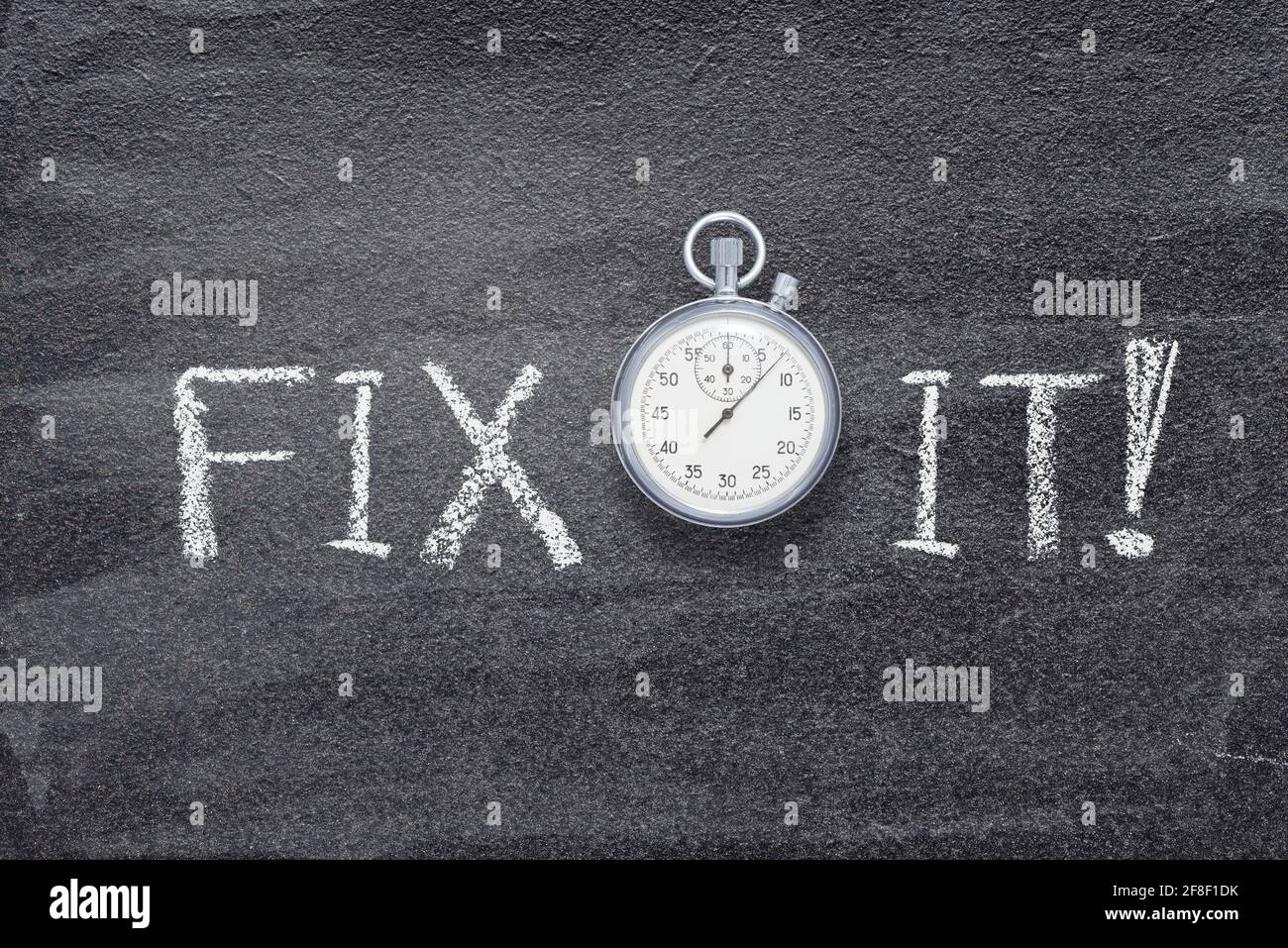 fix it exclamation written on chalkboard with vintage precise stopwatch ...