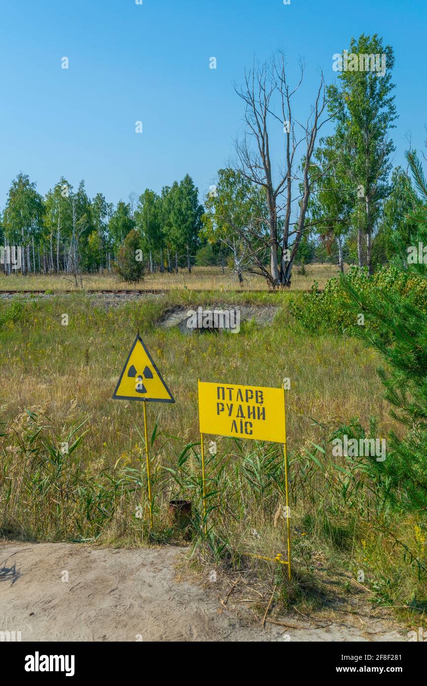 Yellow sign marking buried radioactive material in Chernobyl exclusion ...