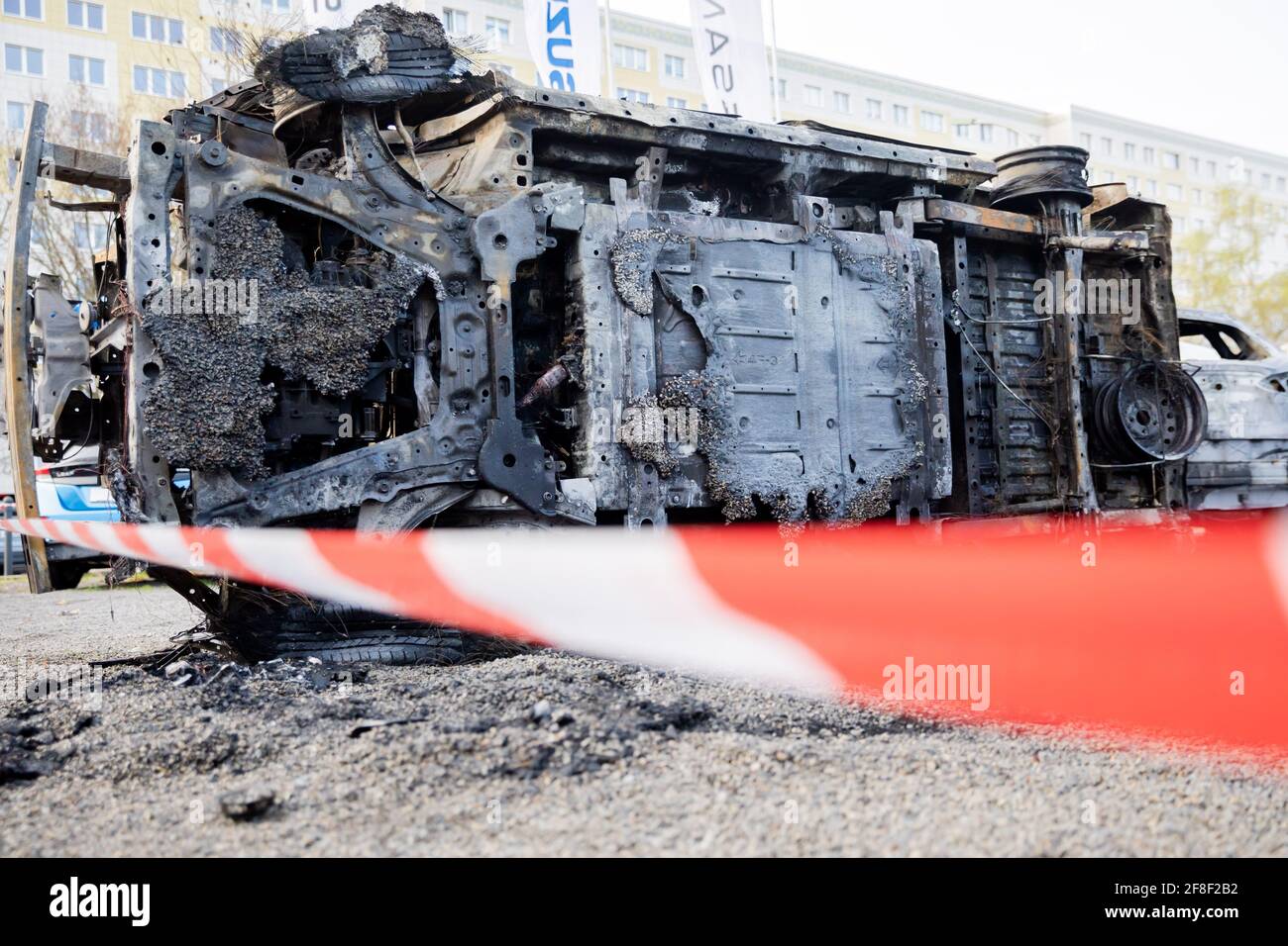 Berlin, Germany. 14th Apr, 2021. A burnt electric car is seen on the ...