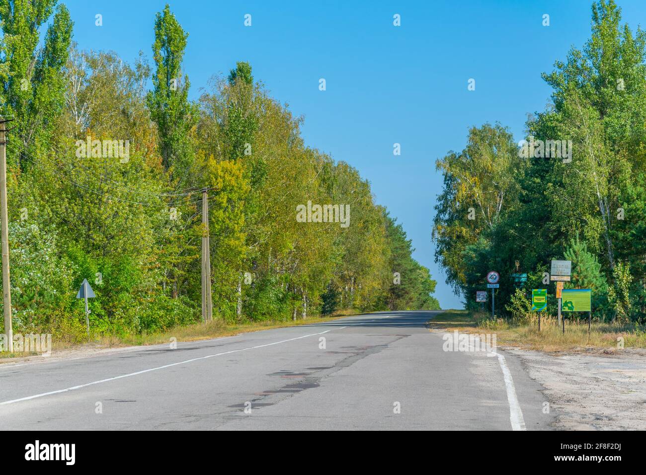 Main road leading to Pripyat town in the Ukraine Stock Photo - Alamy