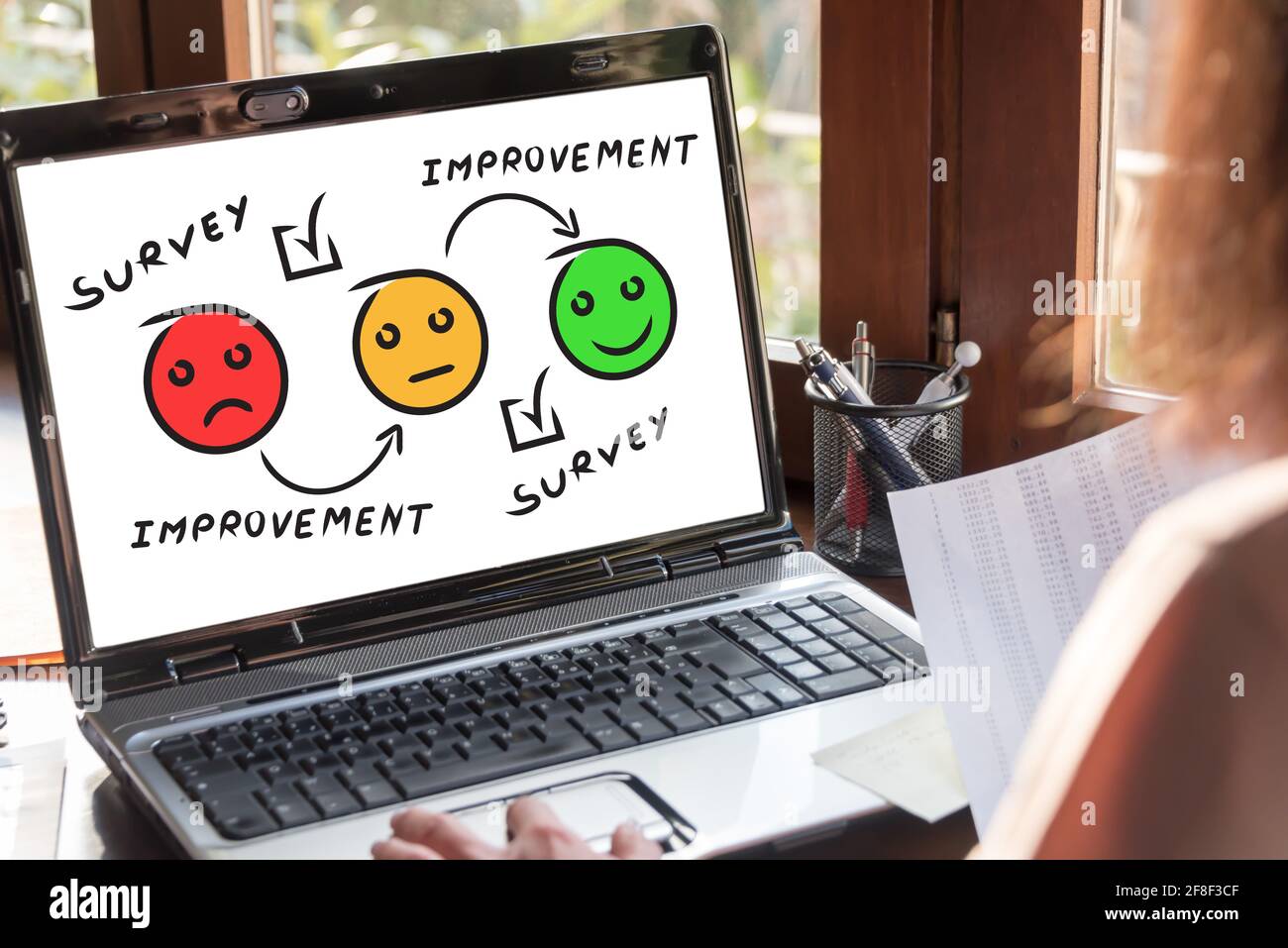 Laptop screen showing survey concept Stock Photo - Alamy