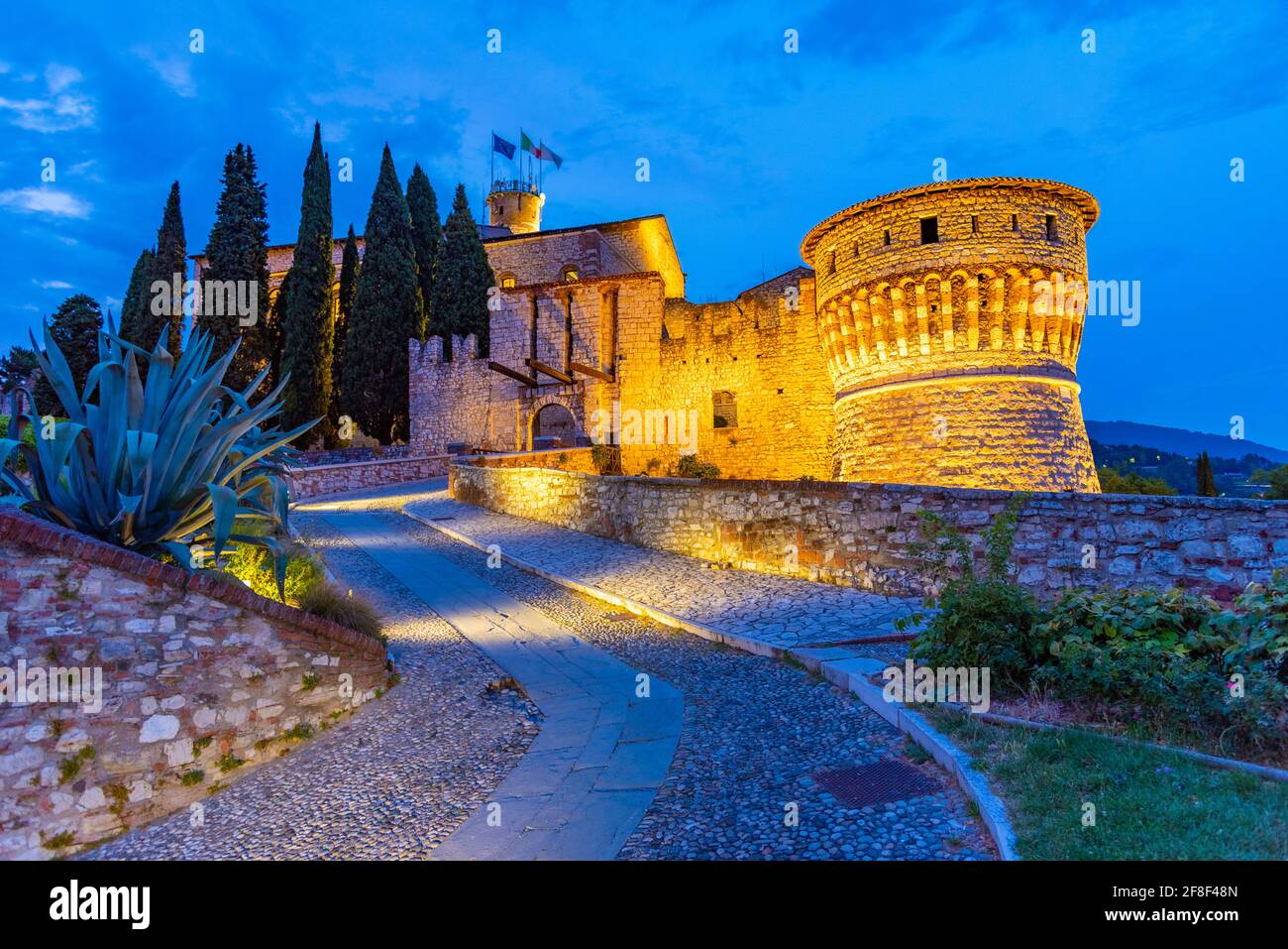 Sunset view of the Brescia castle in Italy Stock Photo - Alamy