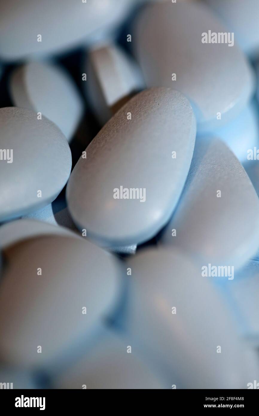 Blue pharmaceutical pills close up medical modern background high ...