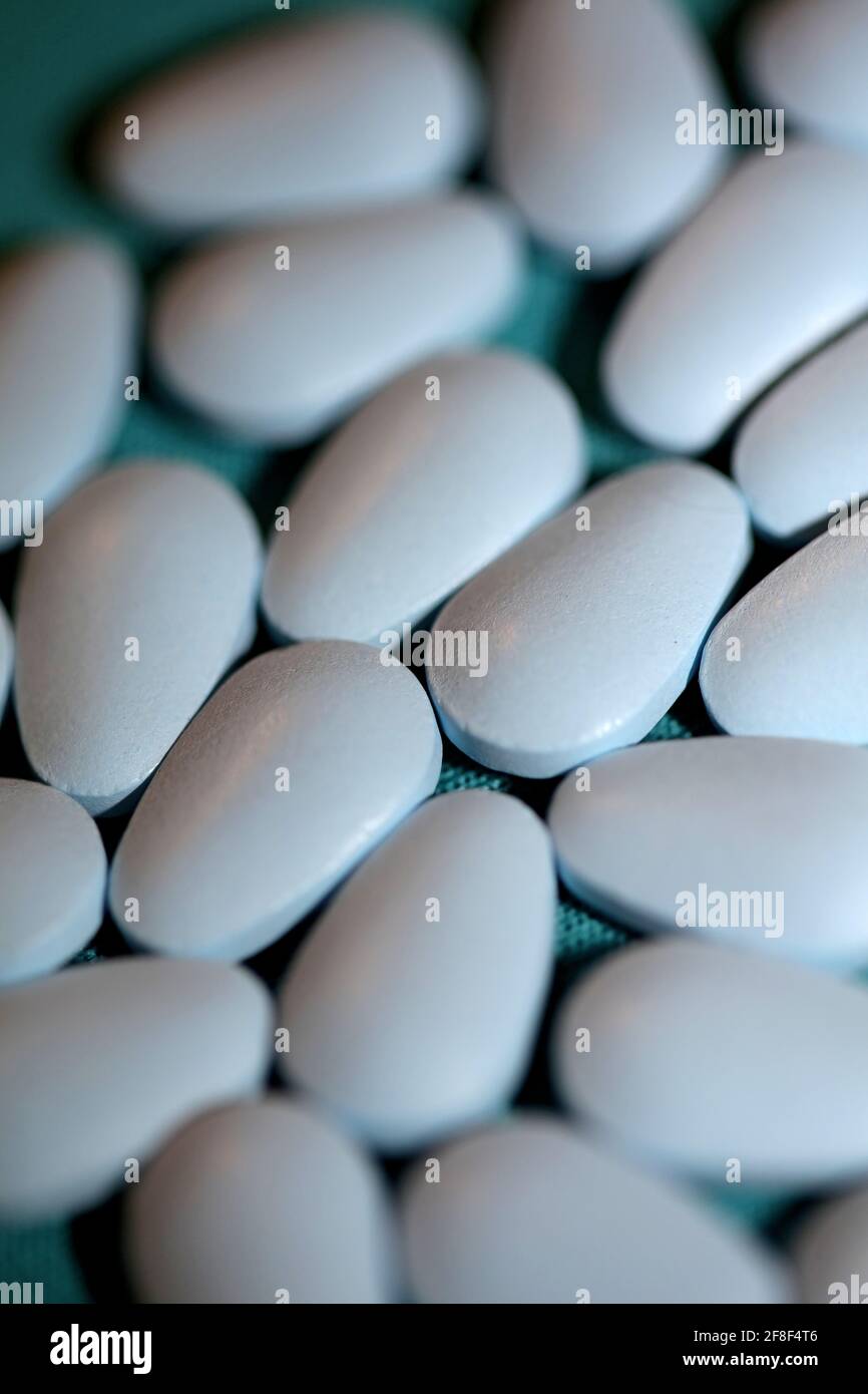 Blue pharmaceutical pills close up medical modern background high ...