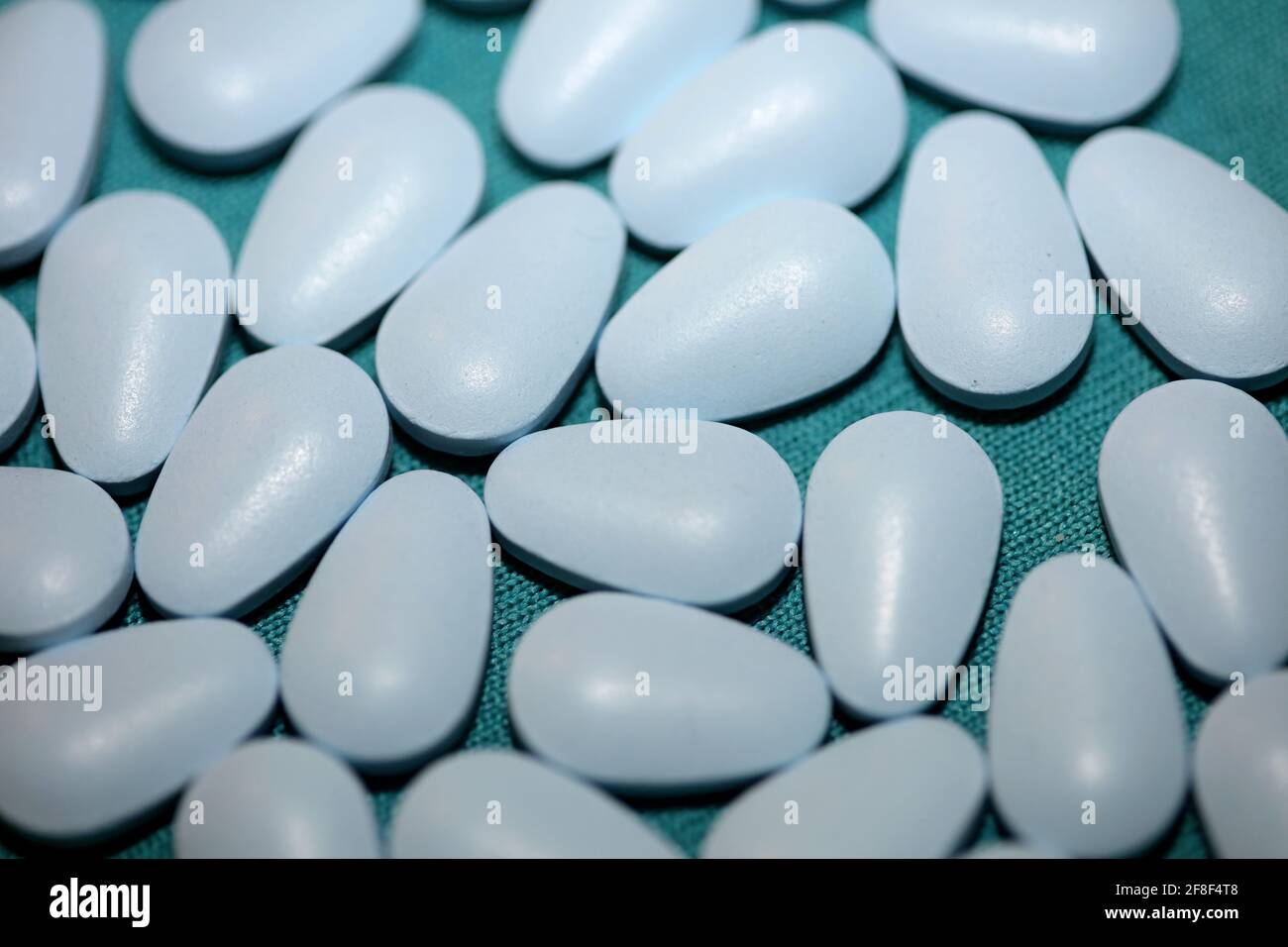 Blue pharmaceutical pills close up medical modern background high ...