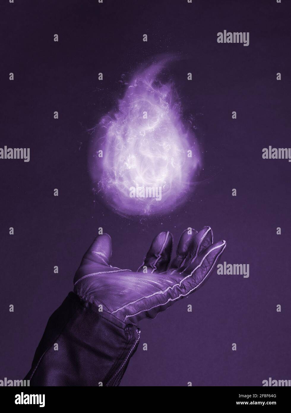 Levitating magic fire flame on a special glove - Concept of magic Stock ...