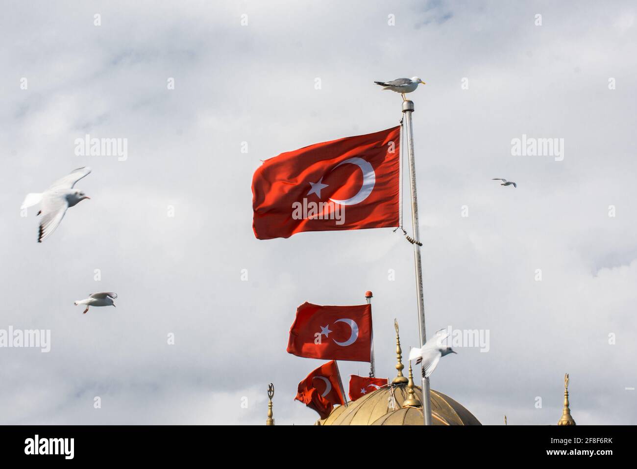 Turkish national flag with white star and moon on a pole in sky Stock ...