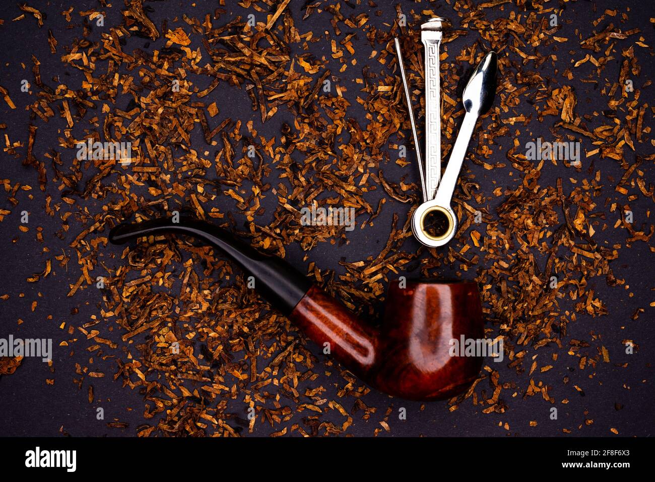 Pipe and pipe smoking accessories Stock Photo - Alamy