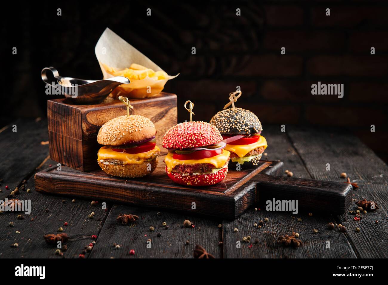 Mini burgers set with fries and sauce Stock Photo - Alamy