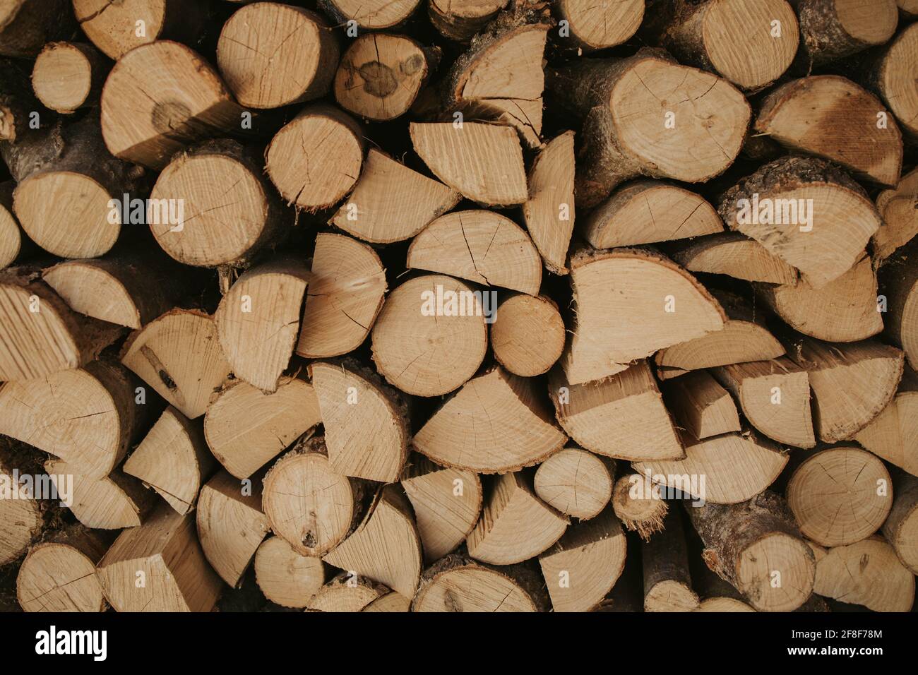 Pile of split logs gathered together - nice woody texture Stock Photo ...