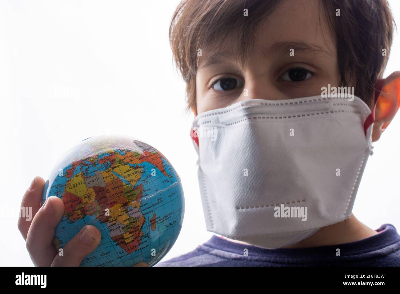 Kid wear health masks to prevent virus and germs. Disease protection ...