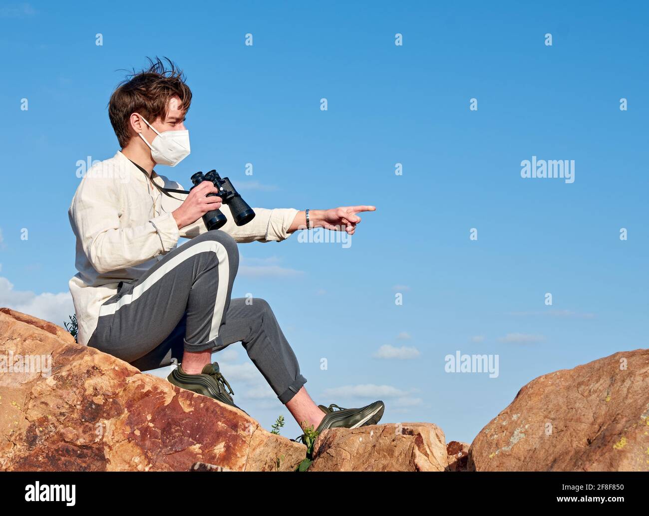 Guide showing people rock hi-res stock photography and images - Alamy