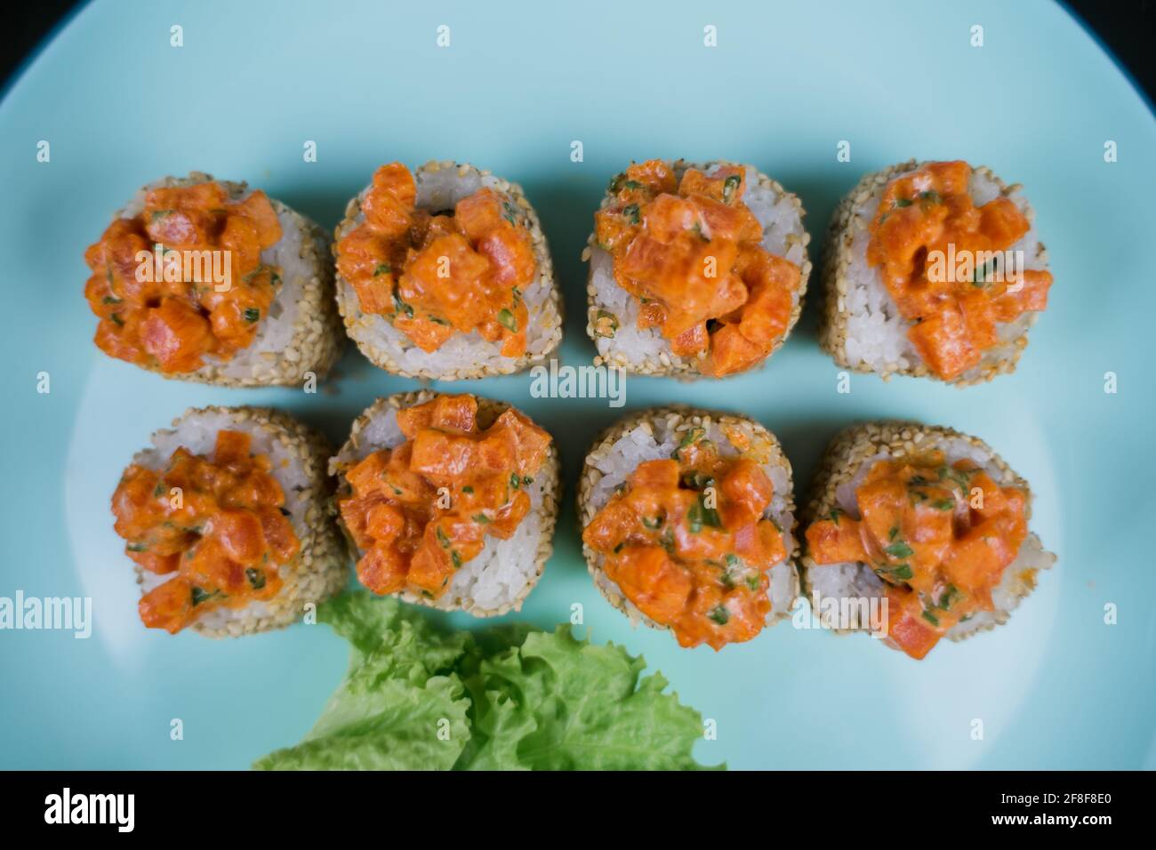 a Japanese roll with sesame seeds and rice Stock Photo - Alamy
