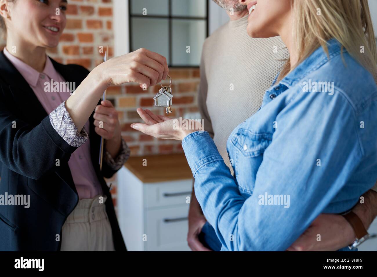 Close up estate agent giving hi-res stock photography and images - Alamy