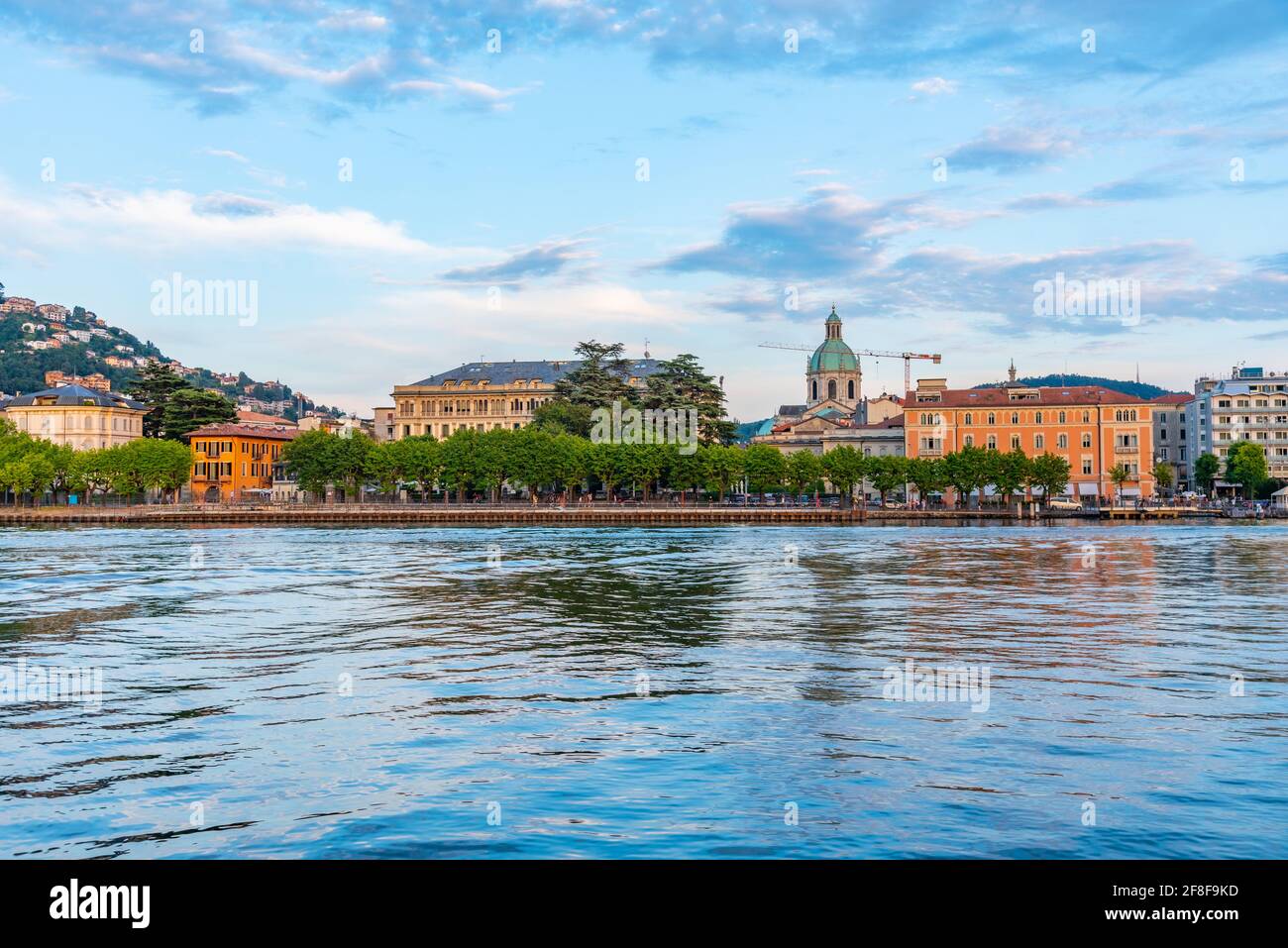 Sunset cityscape of Italian town Como Stock Photo - Alamy