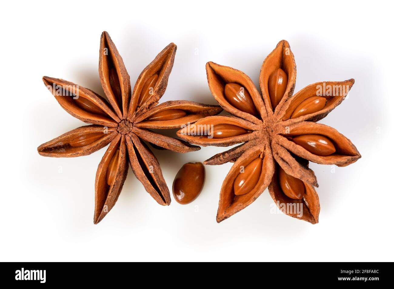 Star anise. Two star anise fruits with seed. Macro close-up Isolated on ...