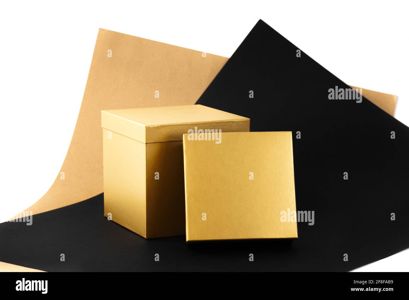 set of two minimal gift boxes, big open golden shining box on a ...