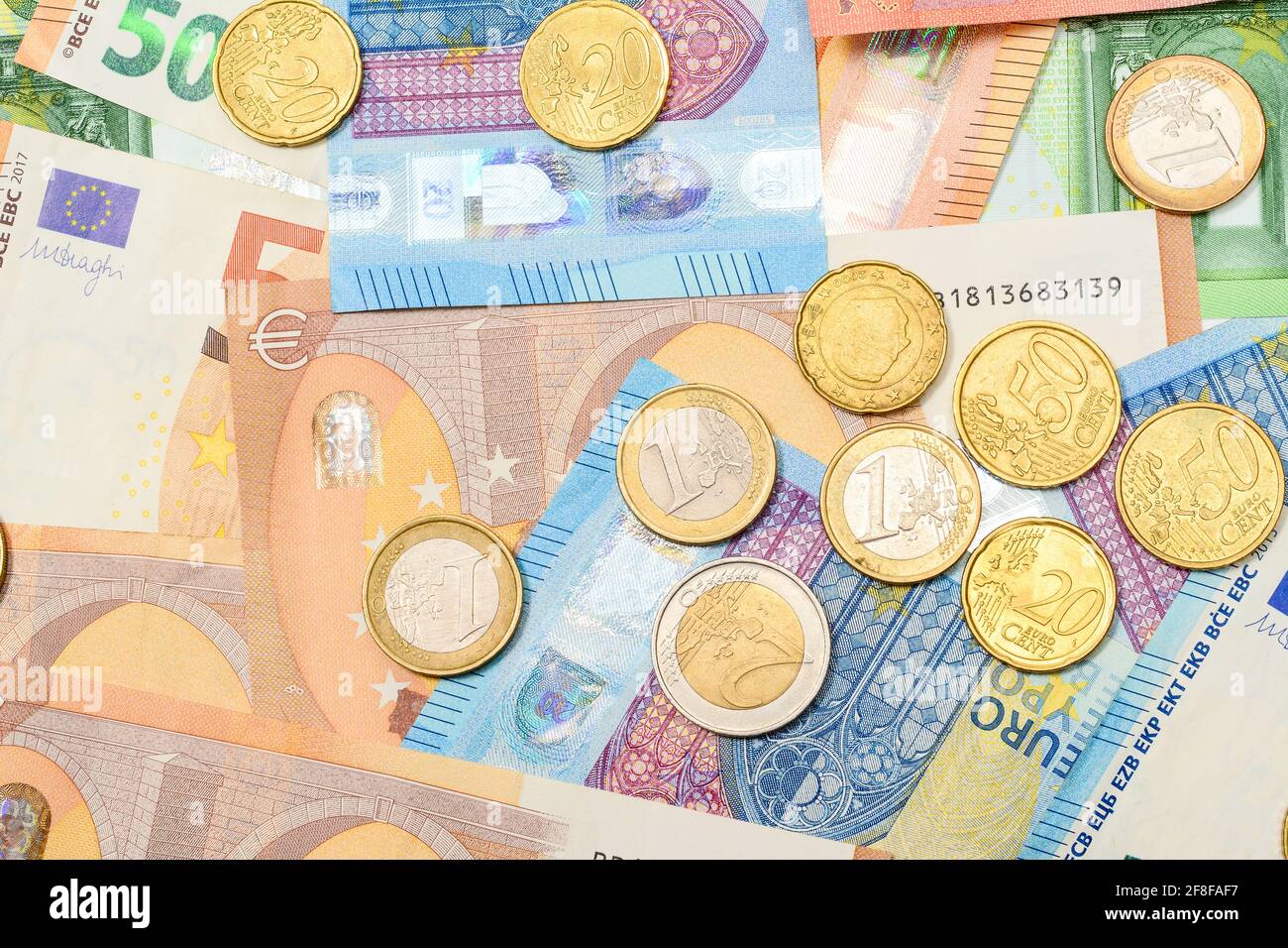 Euro coins and banknotes of different value. Various Euro currency ...