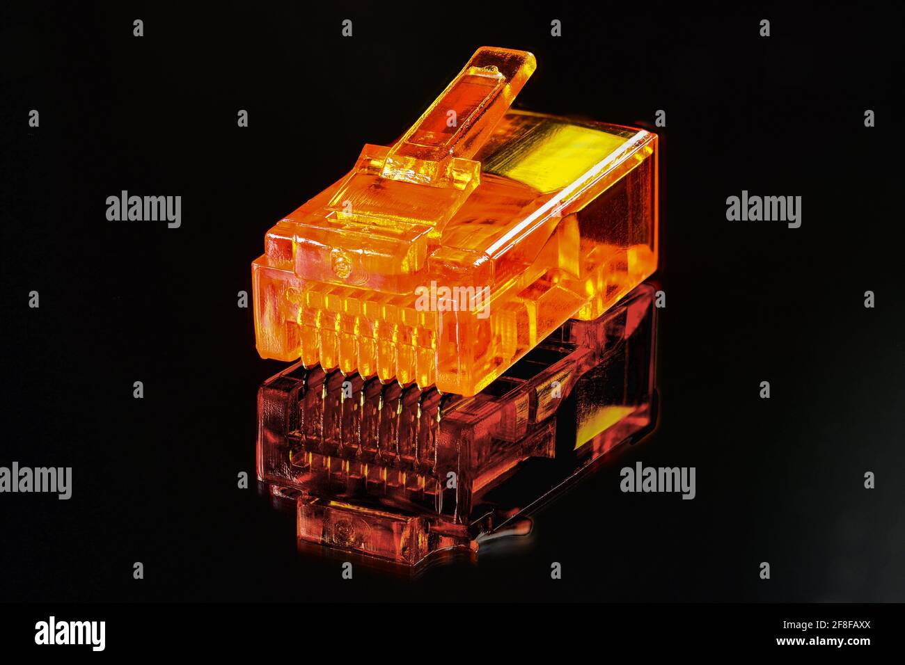 Connector rj-45. Orange transparent connector rj45 for network and ...