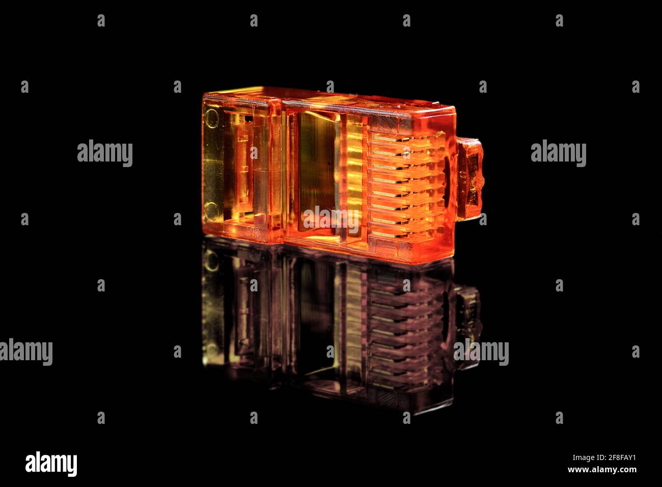 Connector rj-45. Orange transparent connector rj45 for network and ...