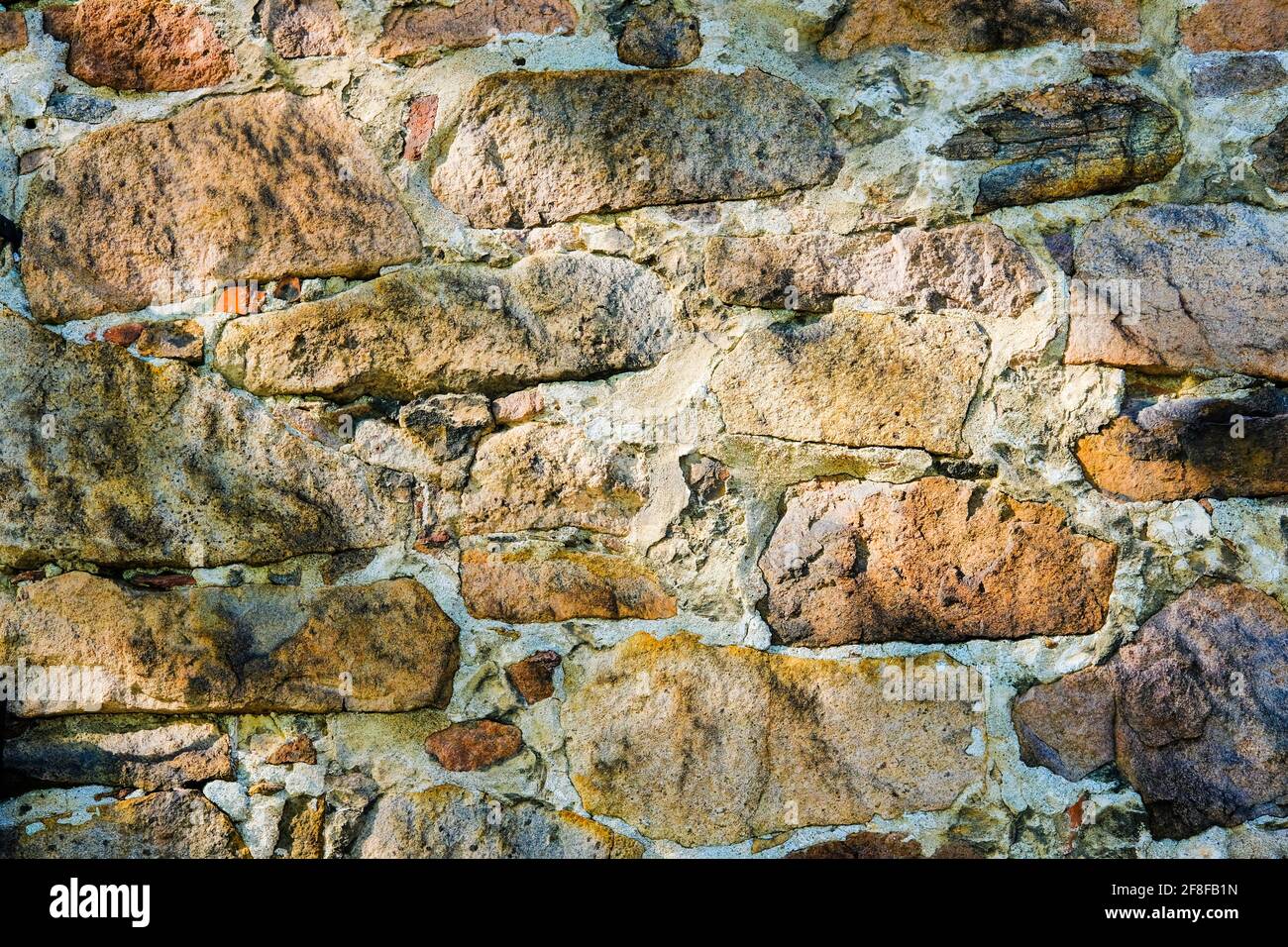 Medieval stone wall background and texture, close up Stock Photo - Alamy