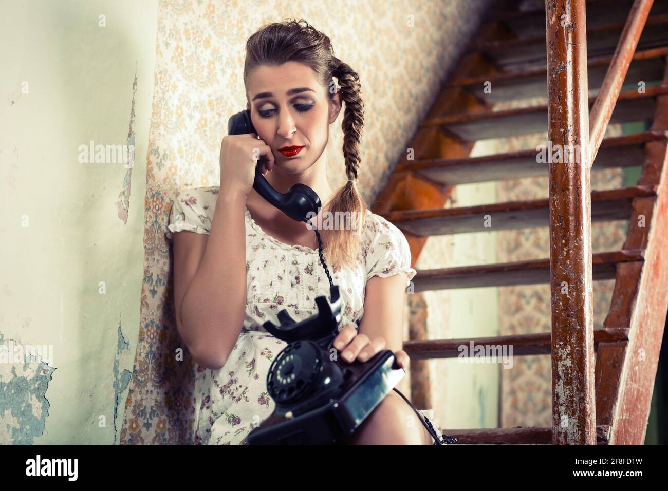 Woman cry stairs hi-res stock photography and images - Alamy