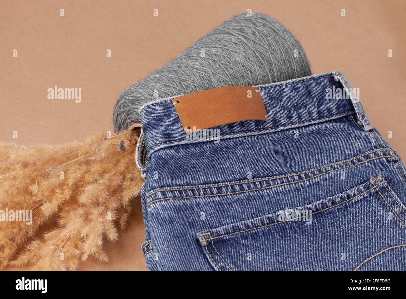 Clothing tag threads hi-res stock photography and images - Alamy