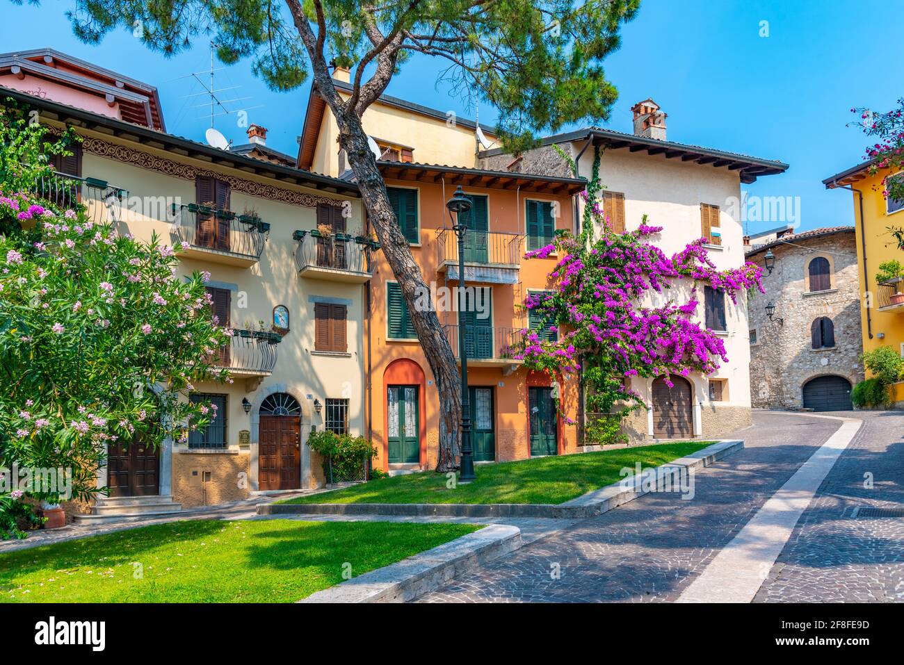 Narrow street in Gardone Riviera, Italy Stock Photo - Alamy