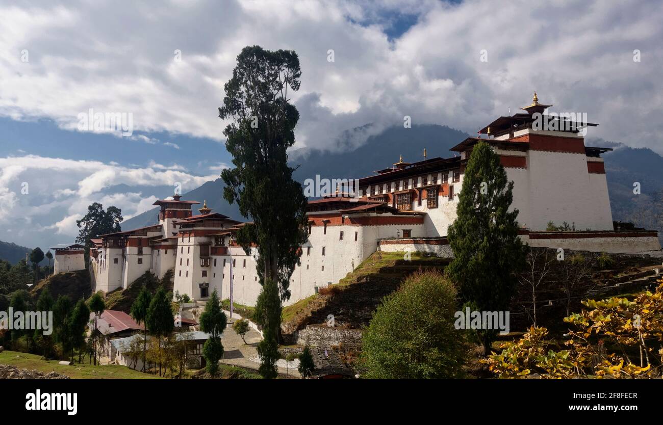 View of Trongsa Dzong fort situated on a spur, a wild rocky area, above ...