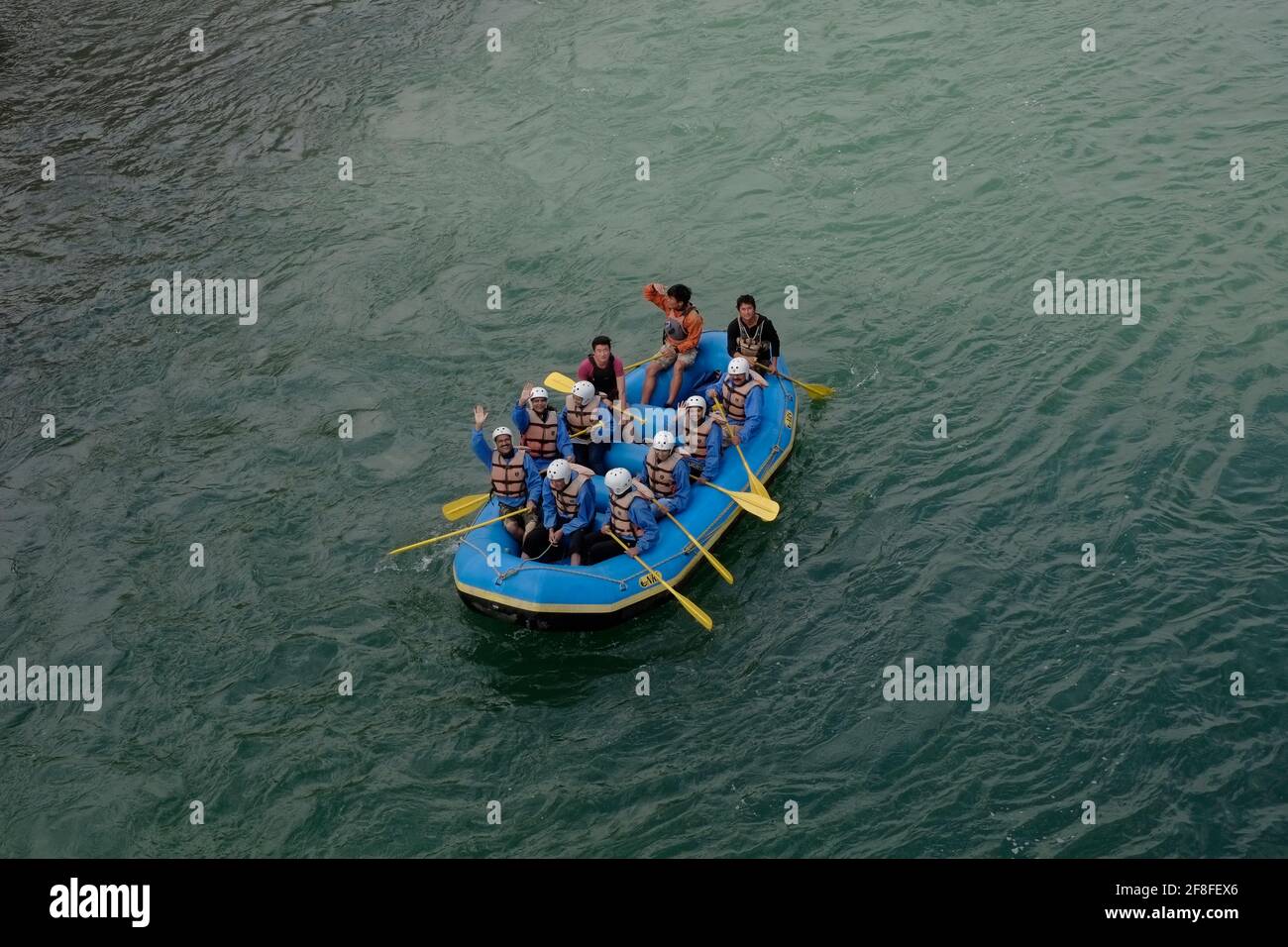 A group of tourists from India rafting on the Mo Chhu river in the ...