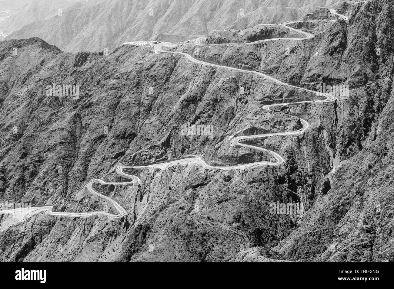 Steep, winding road to the high plateau of Abha in the southeast of ...