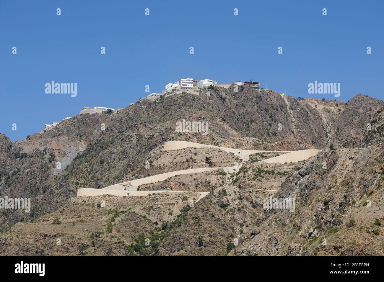 Steep, winding road to the high plateau of Abha in the southeast of ...