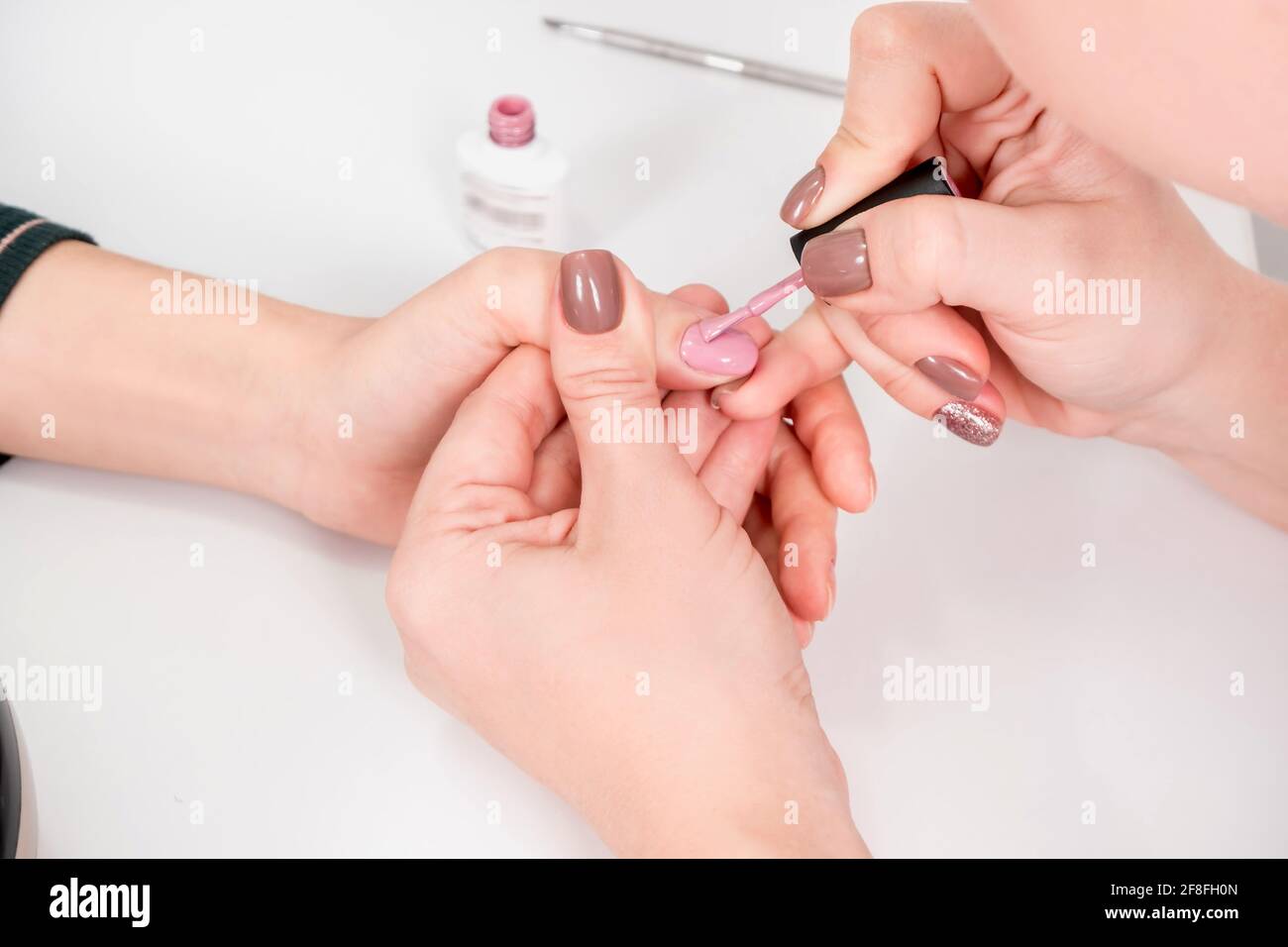 Manicure process on female hi-res stock photography and images - Alamy