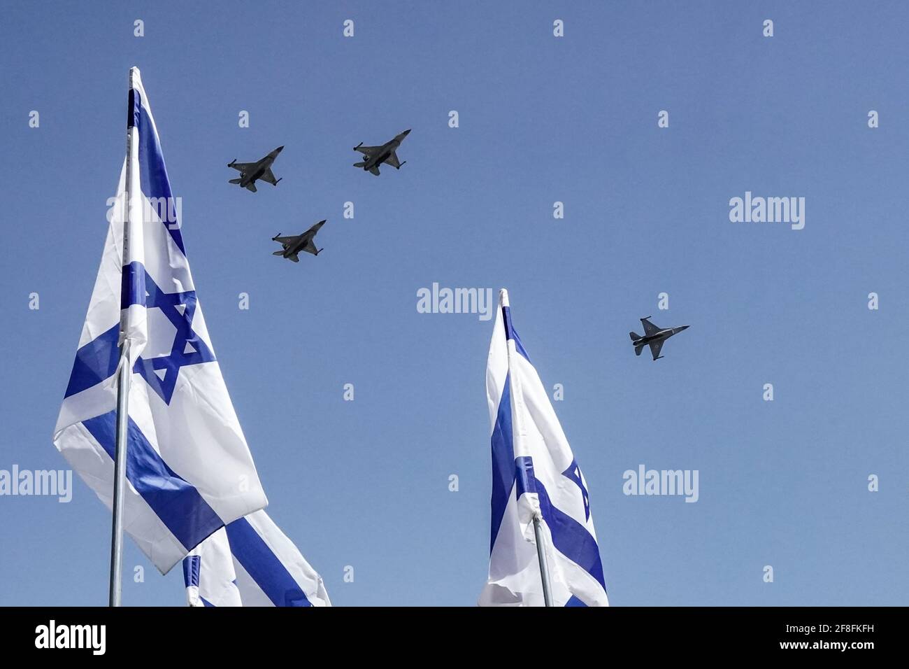 Jerusalem, Israel. 14th Apr, 2021. A missing man formation flyover of ...