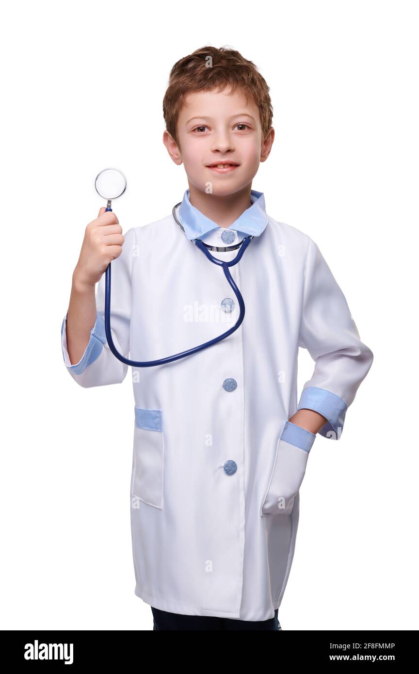 Boy doctor in medical gown with stethoscope on white isolated ...