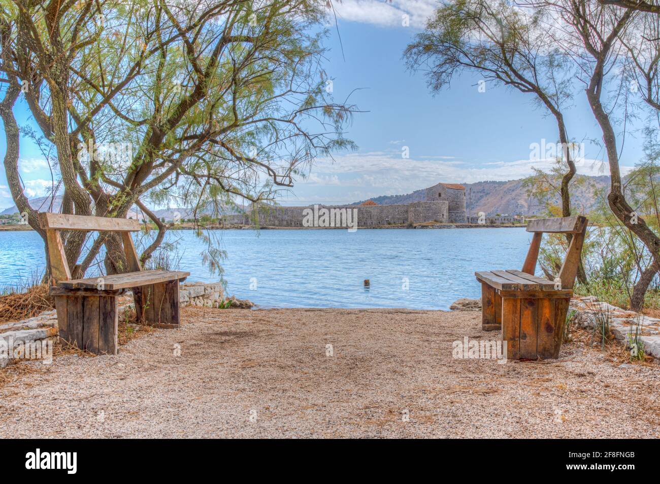 Benches and Venetian Triangle Castle at Butrint, Albania Stock Photo ...