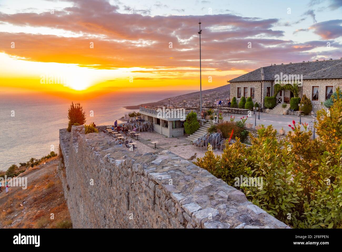 Sunset view of courtyard of Lekuresi castle at Sarande, Albania Stock ...