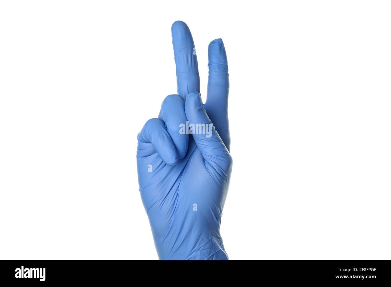 Hand in medical glove show two fingers isolated on white background ...