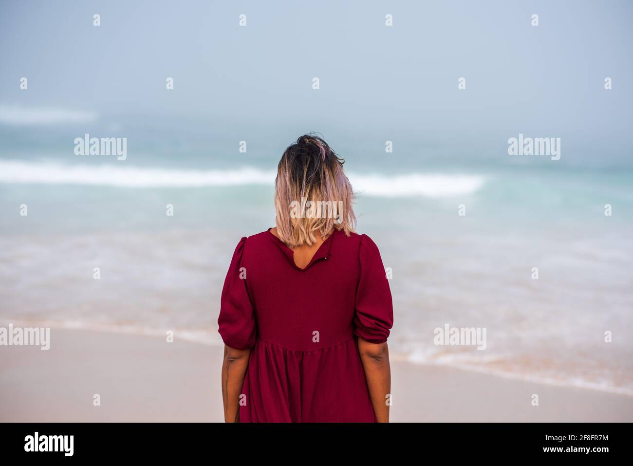 Lady watching ocean hi-res stock photography and images - Alamy
