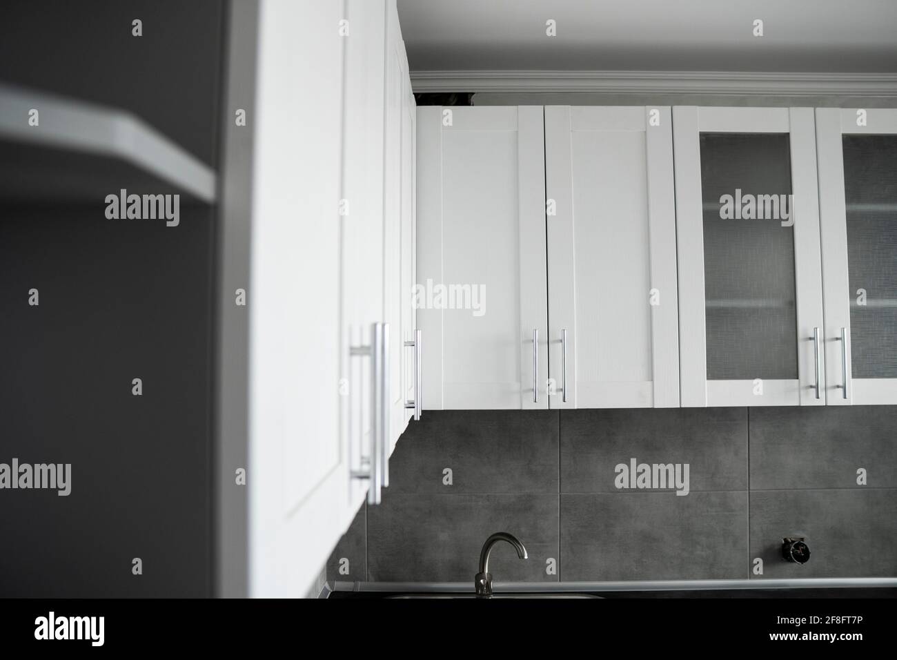 Modern minimalism style kitchen interior in monochrome tones. Custom ...