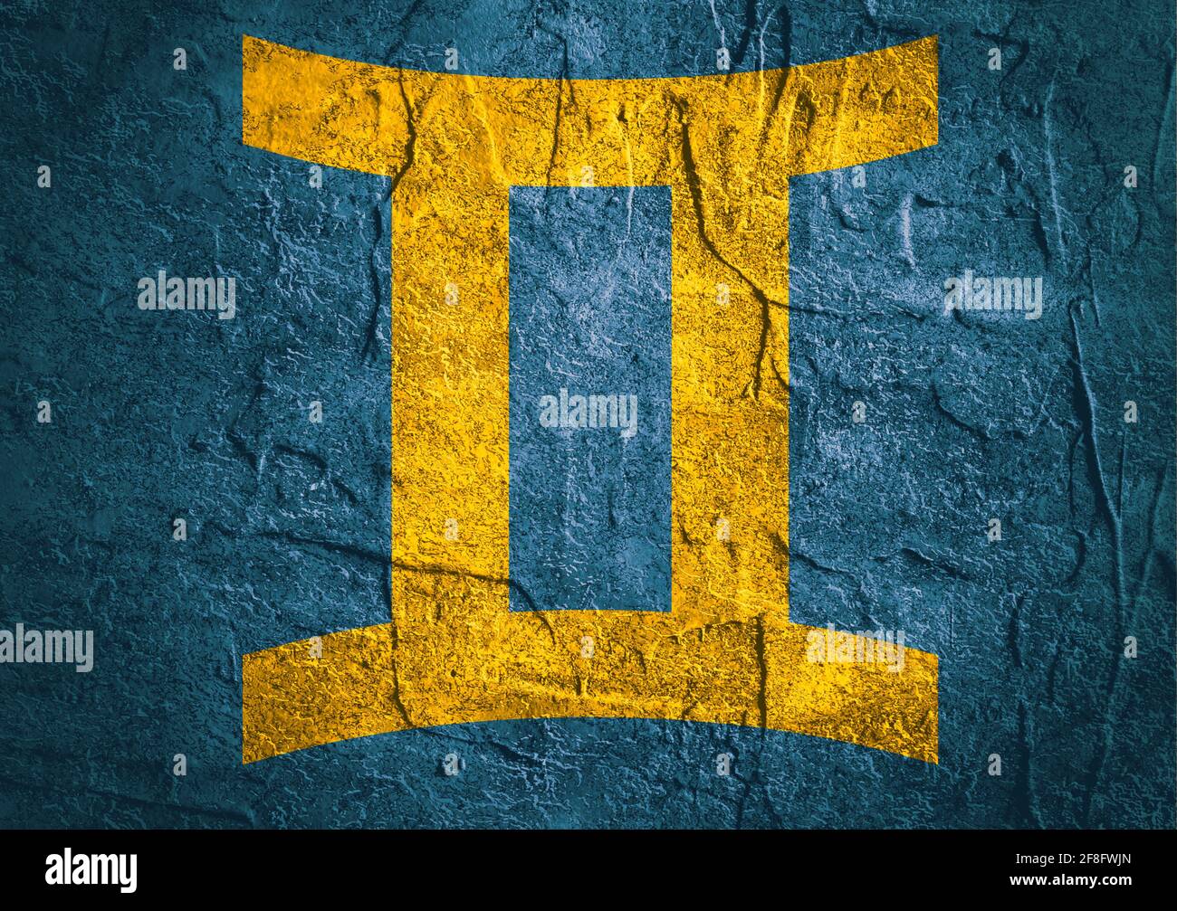 twins astrology sign. Yellow astrological symbol on concrete textured ...