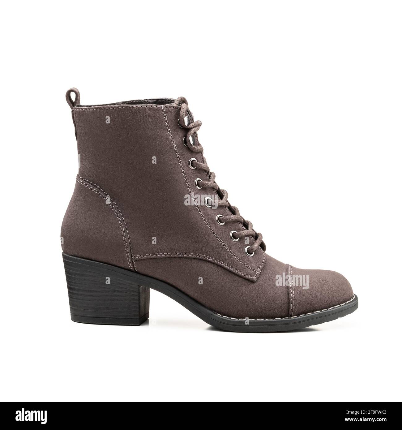 Isolated on white background female demi-season brown boot with laces ...