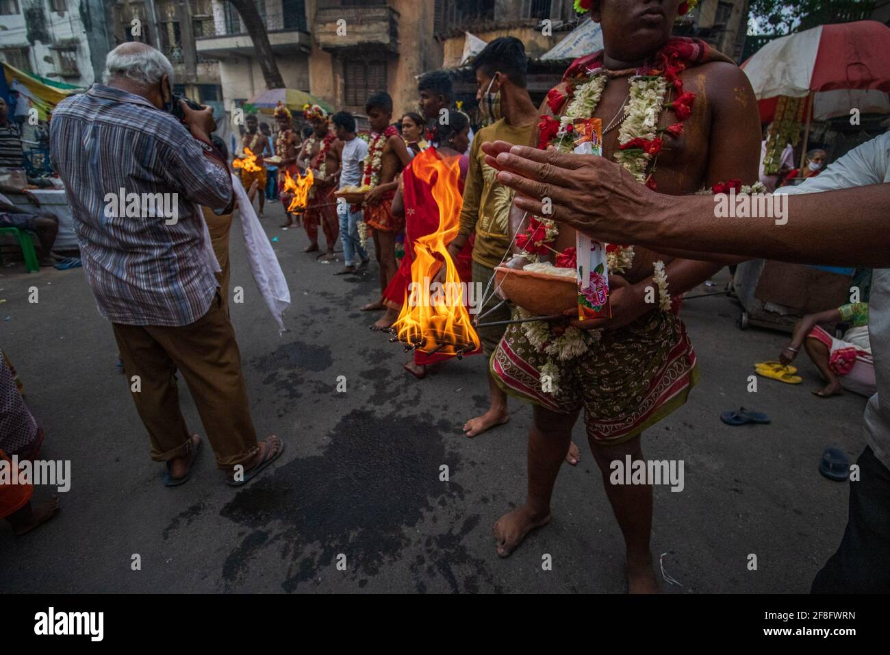 Kolkata, India. 13th Apr, 2021. Gajan festival is an old folk festival ...