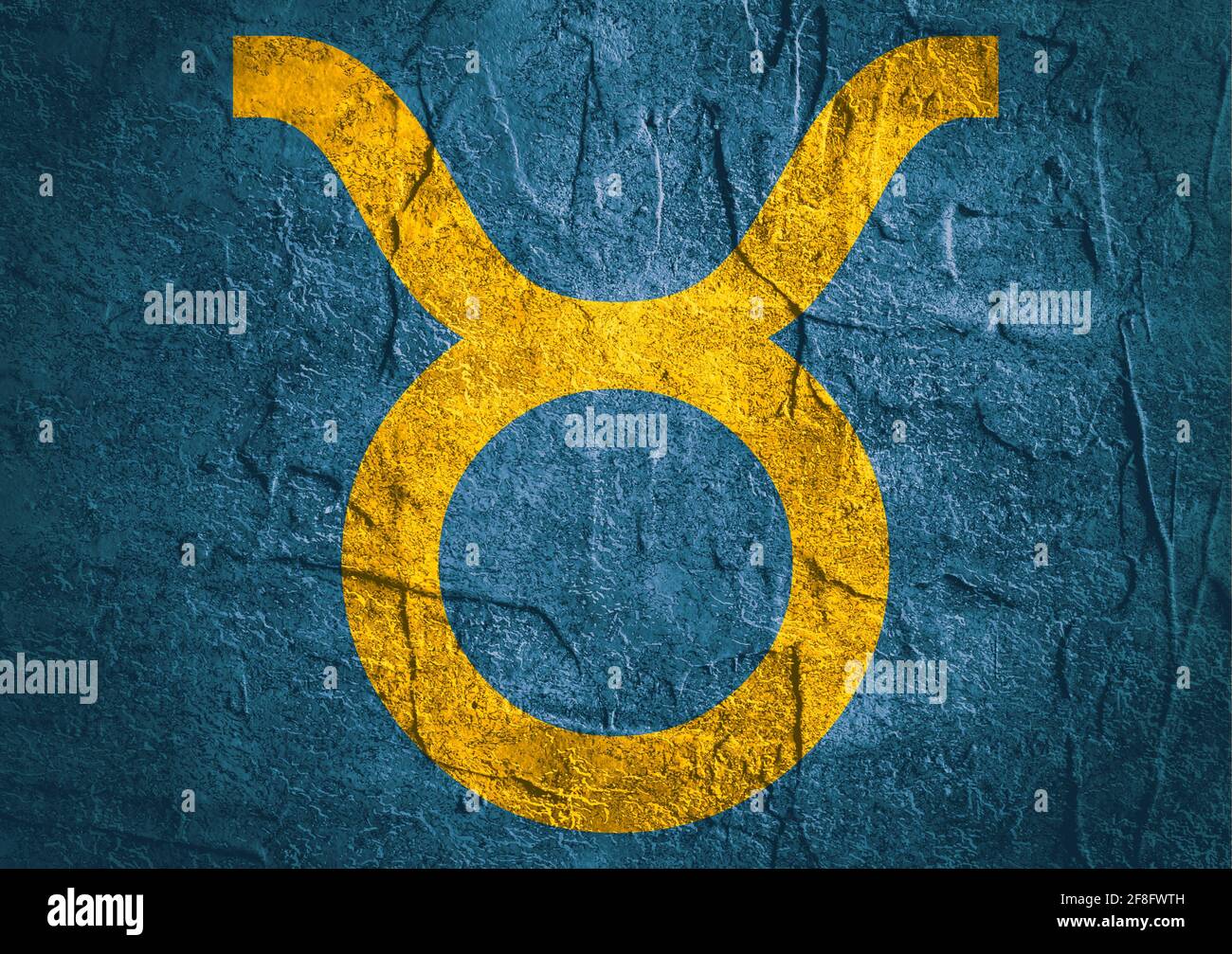 Bull astrology sign. Yellow astrological symbol on concrete textured ...
